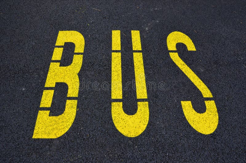 Yellow Bus and Bus Text on the Road in Tbilisi Stock Photo - Image of ...