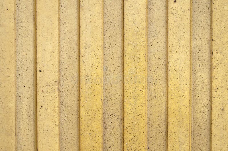 Yellow Texture of Poured Concrete with Repeating Vertical Stripes ...