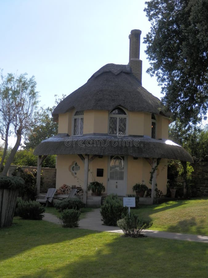 Yellow thatched cottage stock image. Image of thatched - 79982741