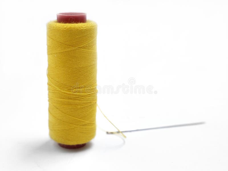 Yellow Thread and Needle Over White Stock Image - Image of handmade ...