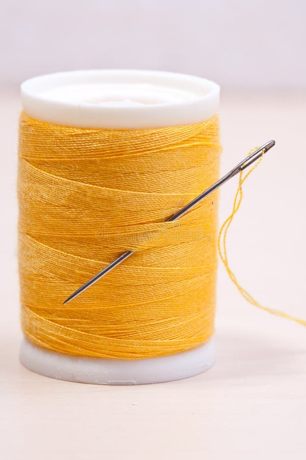 Yellow threads stock photo. Image of filament, tailor - 16515336