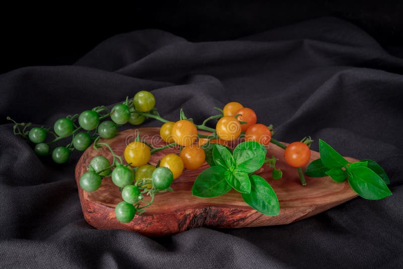 Yellow Tomatoes Branch on Table Background, Healthy Food Stock Image ...