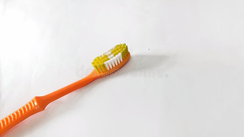 Yellow toothbrush. stock photo. Image of dentist, caring - 299490424