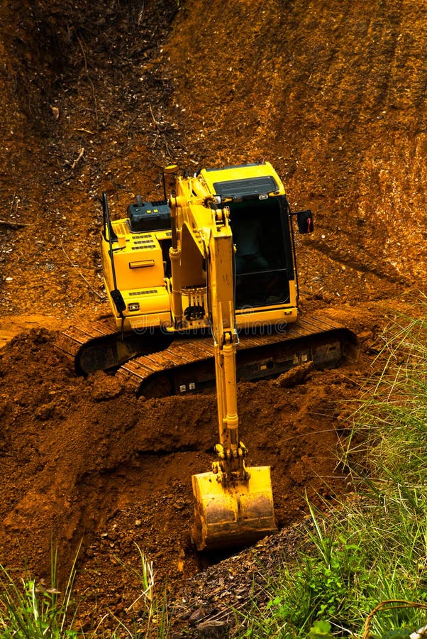 Yellow Track-type Loader Excavator Machine Doing Earthmoving Work Stock ...