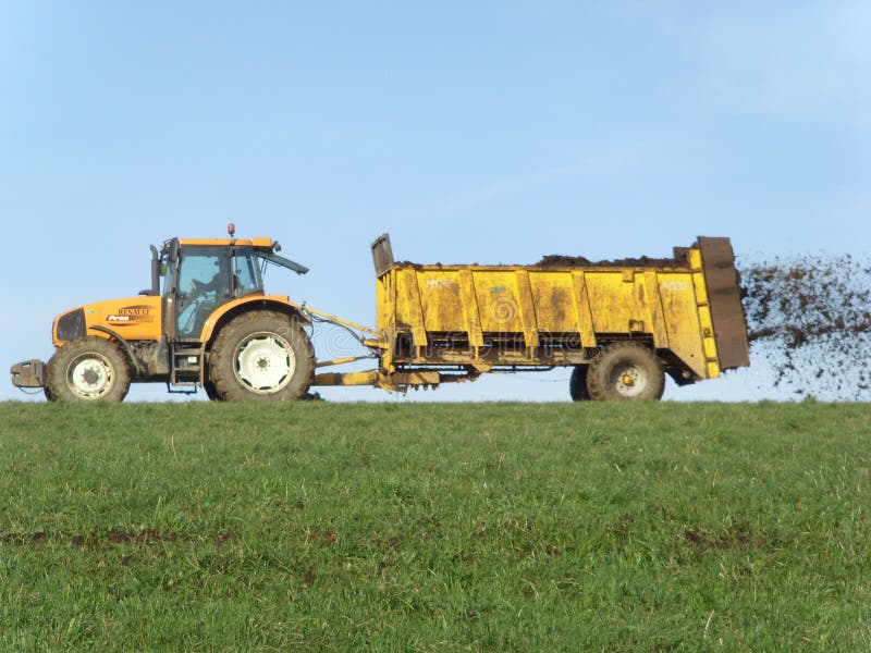 Yellow Tractor stock photo. Image of belgium, grass, land - 4535758