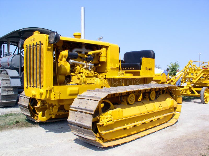 Yellow Tractor stock photo. Image of outdoors, tractor - 642200