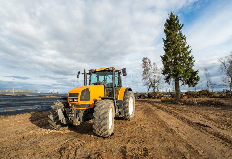Yellow tractor stock image. Image of power, bulldozer - 16194523
