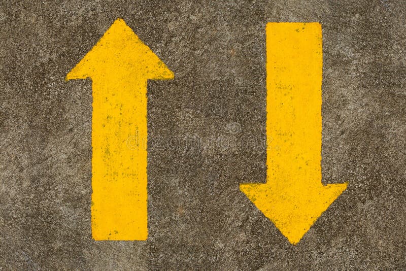 Yellow traffic arrow sign stock photo. Image of black - 56691494