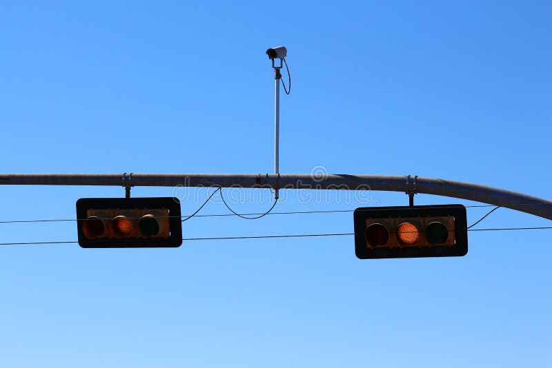 Yellow Traffic Light with Camera Stock Image - Image of streets ...