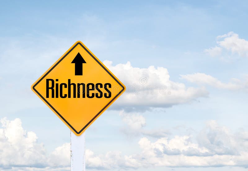 Yellow Traffic Sign Text for Richness Stock Image - Image of letter ...