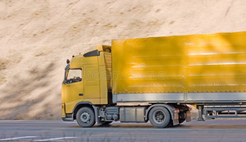 Yellow trailer truck stock photo. Image of advertising - 3948916