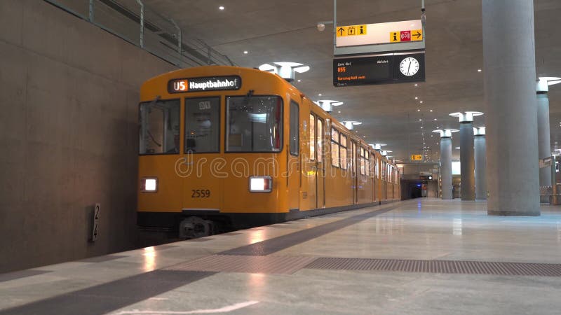 Yellow Train in Berlin Subway Arriving the Platform at Bundestag ...