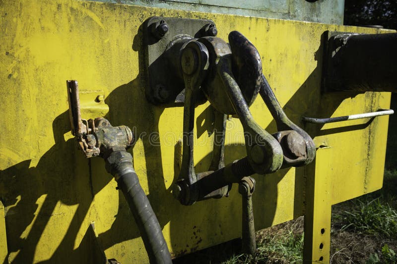 A Yellow Train Car with a Rusty Bolt on the Side Stock Image - Image of ...