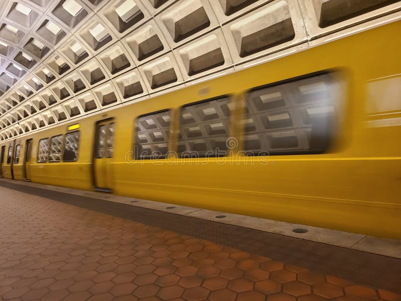 Yellow Train Passes through City Metro Train Station Stock Photo ...