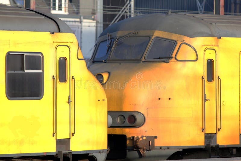Yellow Trains Leaving Station Stock Image - Image of rail, industry ...
