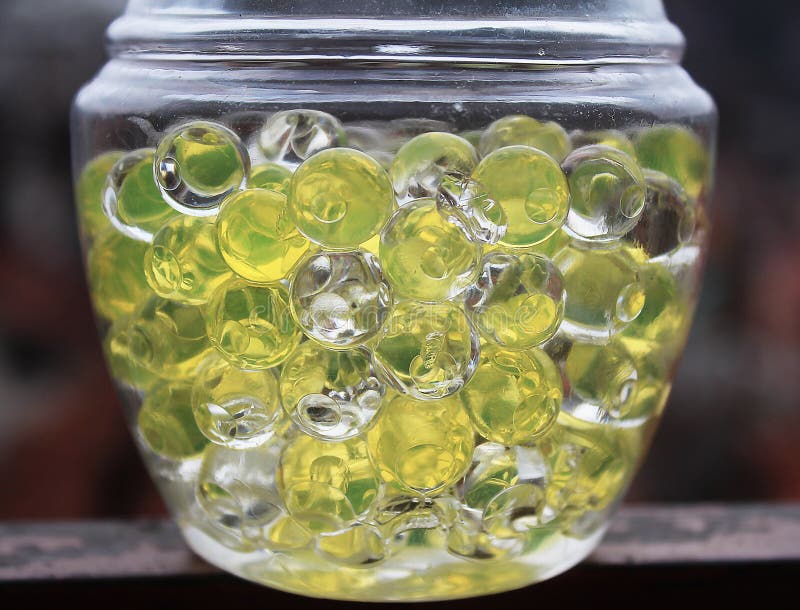 Yellow Bubbles in a Glass Jar Stock Photo - Image of idea, zoom: 138751506