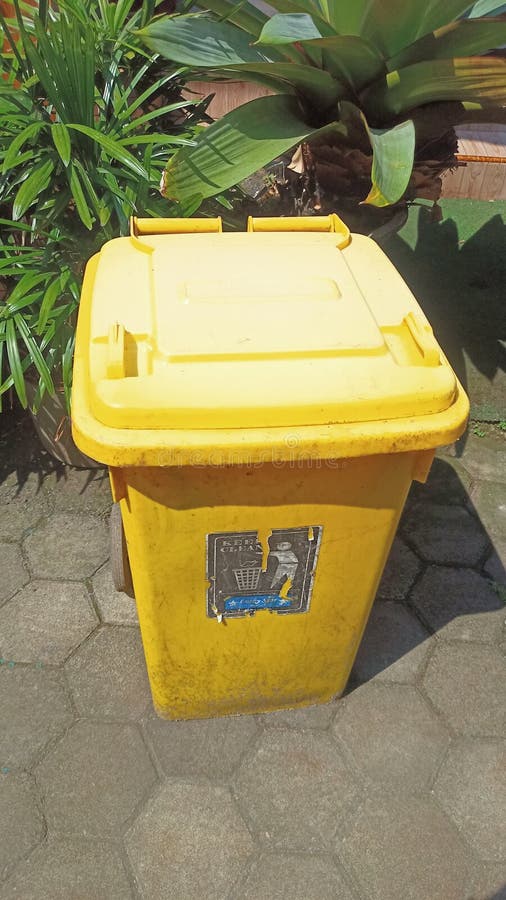 Green and Yellow Rubbish Bin Stock Image - Image of soil, flooring ...