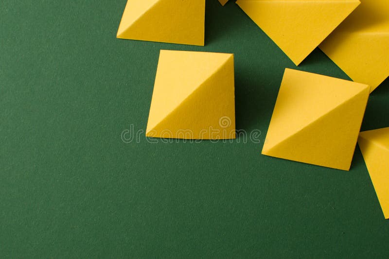 Yellow Triangle Shapes on Green Background with Copy, Empty Space Stock ...
