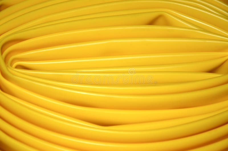 Yellow tube stock image. Image of equipment, tube, reel - 21991623