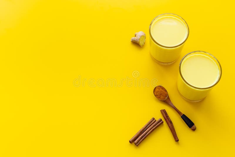 Yellow Turmeric Latte Coffee or Tea. Golden Milk with Turmeric and ...