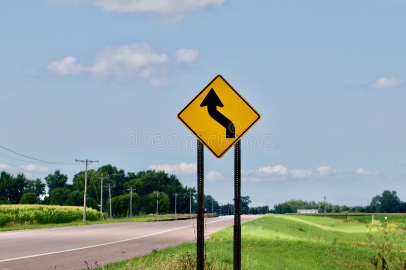 Yellow turn sign stock image. Image of narrow, alert - 97475255