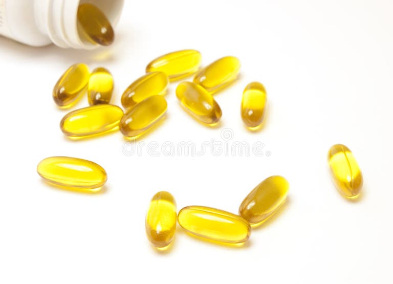 Yellow vitamin pills stock image. Image of pain, capsule - 15403541