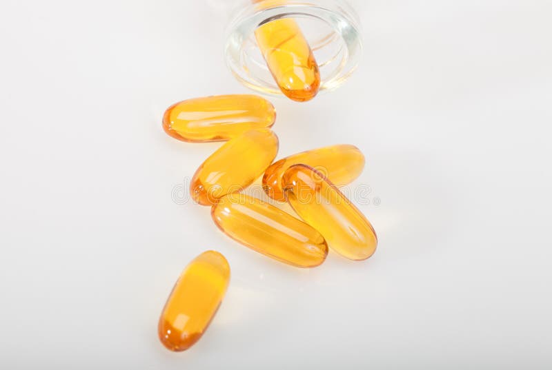 Yellow vitamin pills stock image. Image of dietary, dose - 39838979