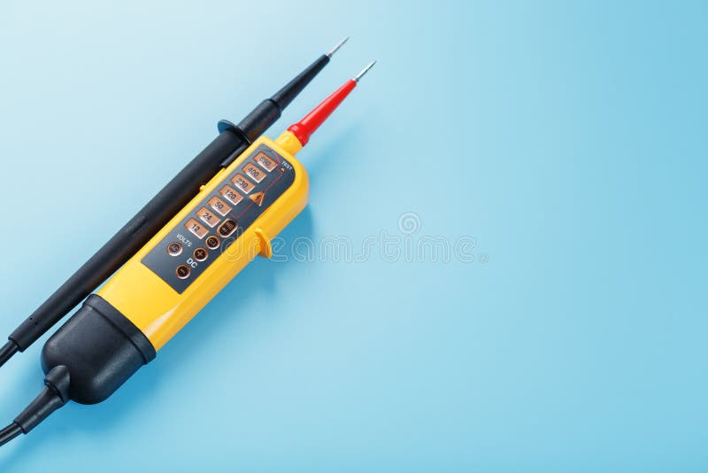 Yellow Voltage Indicator on a Blue Background Stock Photo - Image of ...