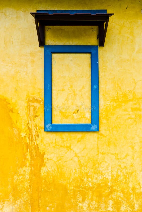 Yellow Wall with Blue Window Frame Stock Photo - Image of background ...