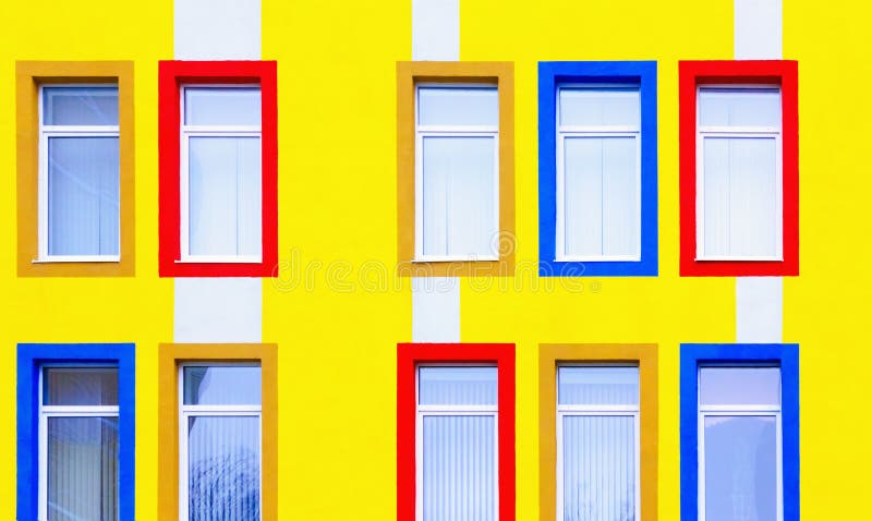 Yellow Wall with Colorful Windows Stock Photo - Image of design, facade ...
