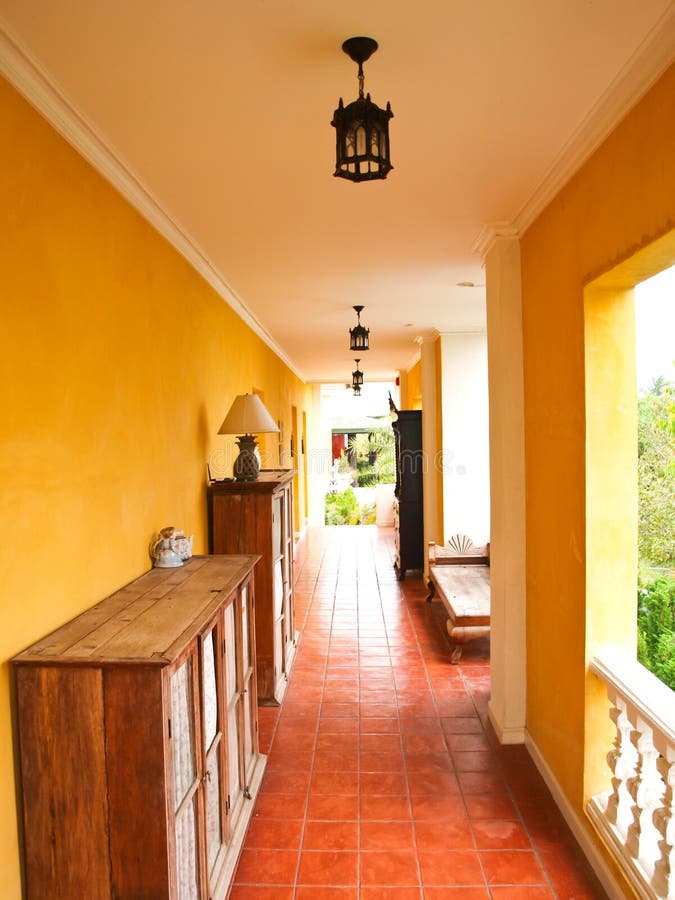 A yellow wall corridor stock image. Image of room, entrance - 30435525
