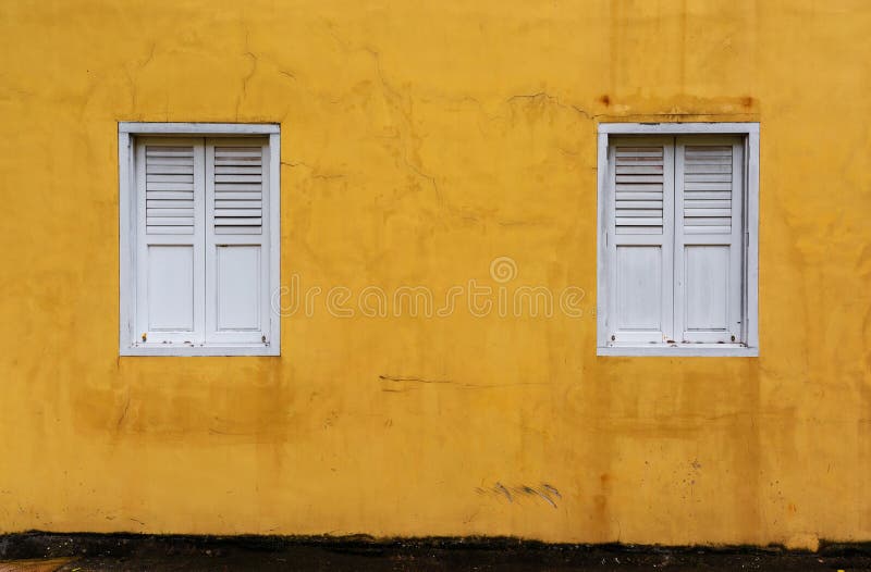 Yellow wall white window stock photo. Image of decorative - 97233054