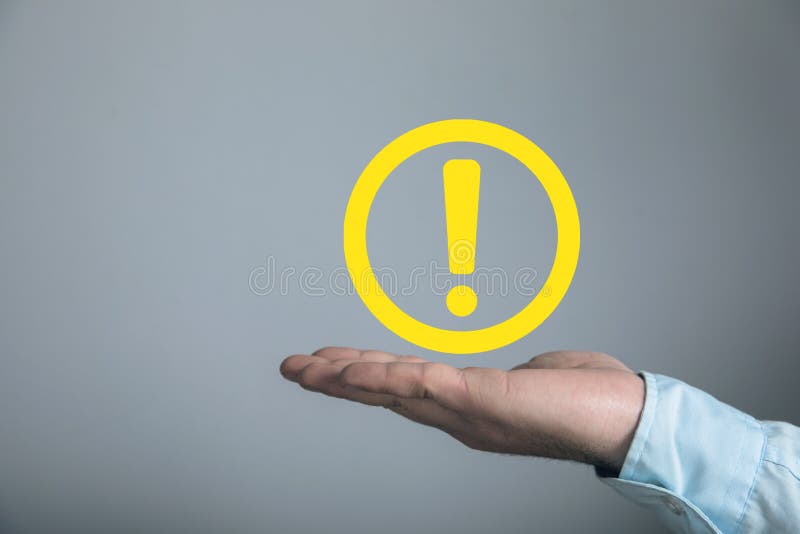Yellow Warning Icon in a Circle Stock Image - Image of palm, risk ...