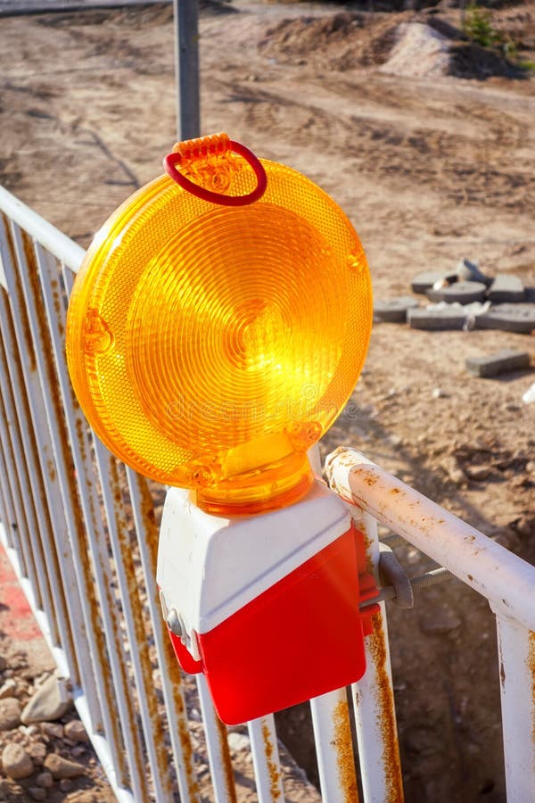 Yellow Warning Light on Fence Stock Image - Image of outdoors, lamp ...