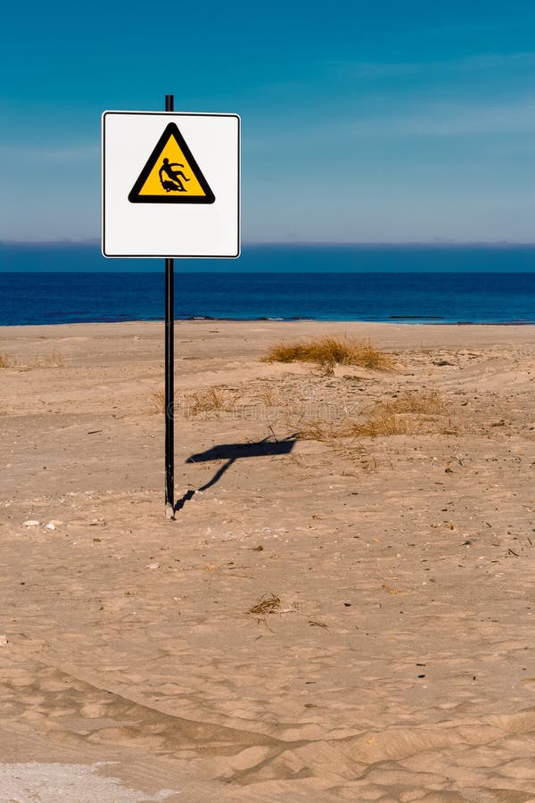 Yellow warning sign stock image. Image of dangerous, seascape - 87829867