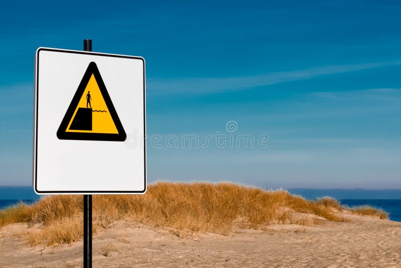 Yellow warning sign stock image. Image of seascape, beach - 88608031