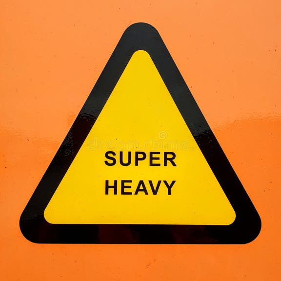 A Yellow Warning Triangle Informing of a Super Heavy Weight Stock Image ...