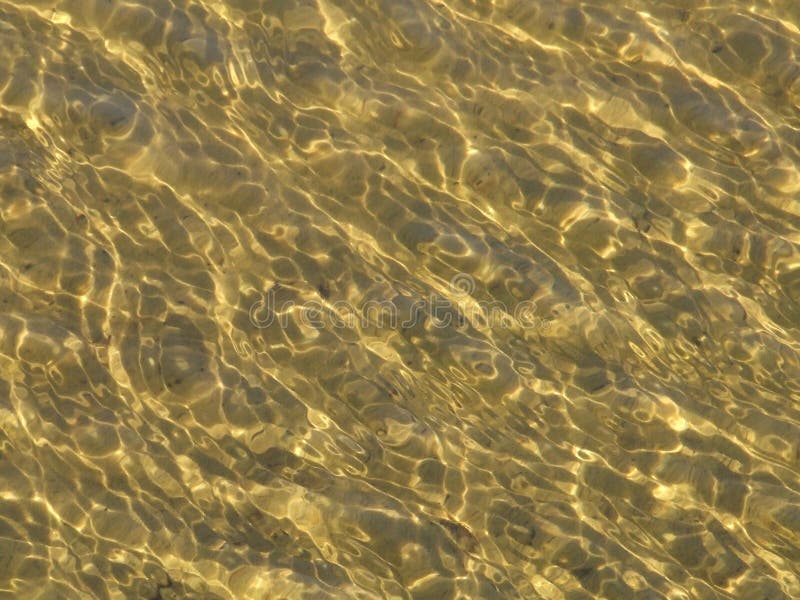Yellow water stock image. Image of reflection, energy - 4231885