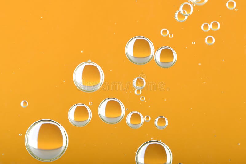 Yellow water bubbles stock image. Image of fizz, gold - 272673887