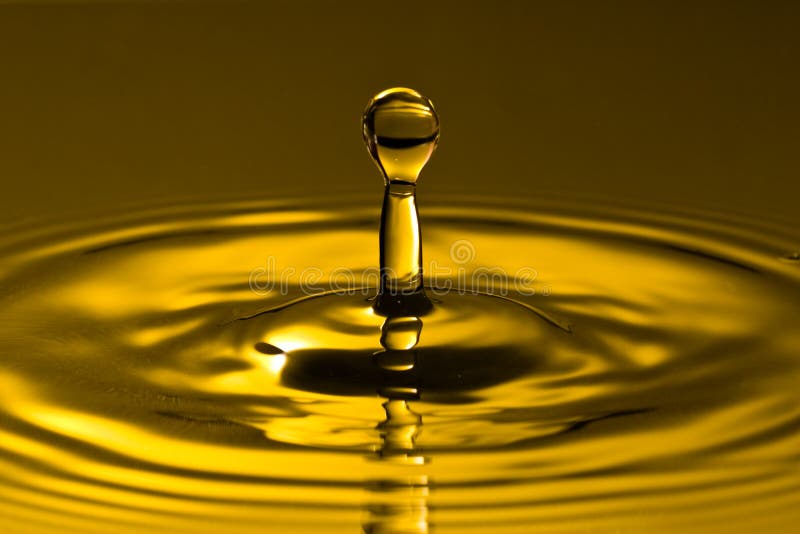 Yellow water splash stock photo. Image of drop, perfection - 14262398