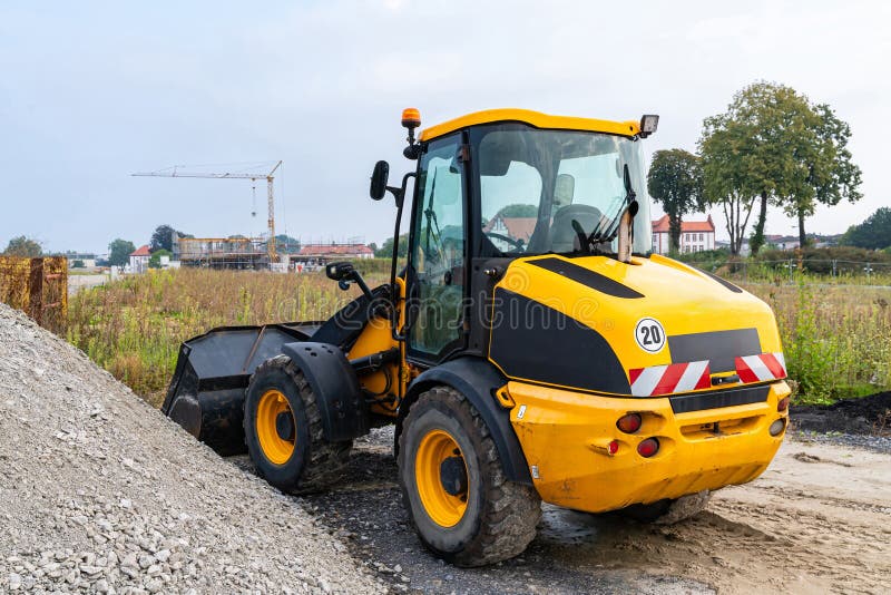 Yellow Wheel Loader on a Construction Site. Stock Photo - Image of ...