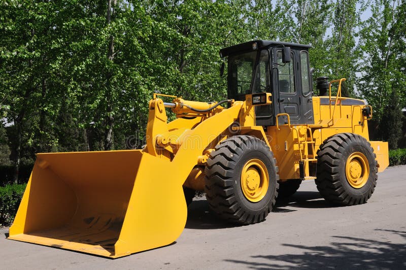 Yellow wheeled loader stock image. Image of heavy, stop - 30360387