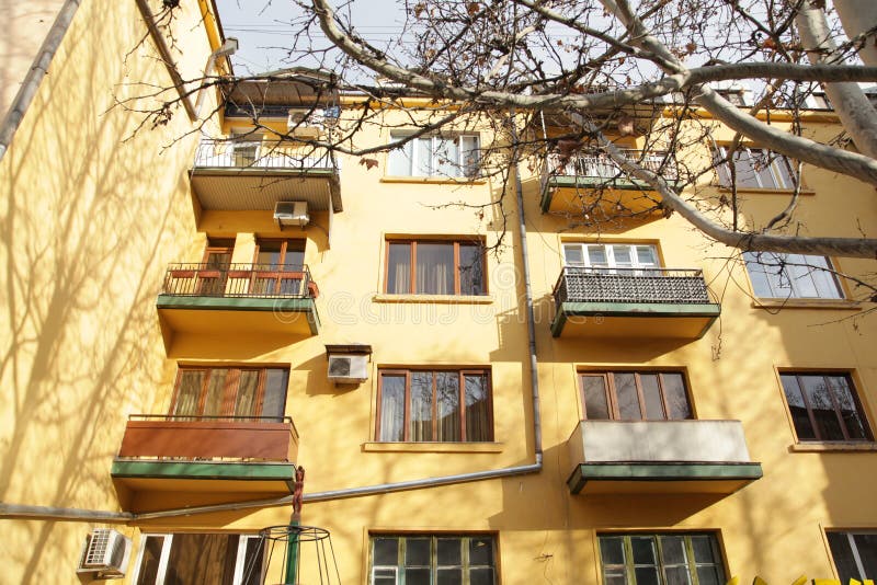 Yellow high-rise building stock photo. Image of modern - 107926004