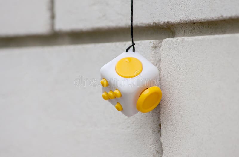 Yellow White Cube Antistress on Brick Wall Background Editorial Image ...