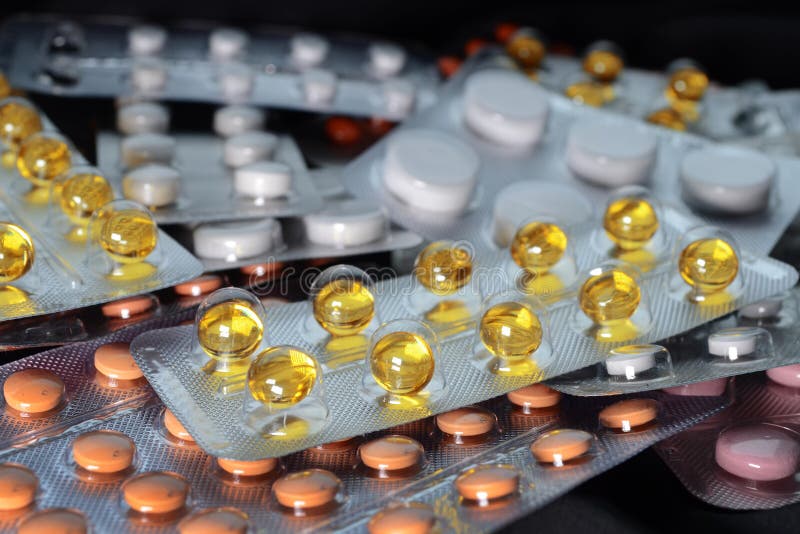 Yellow, White and Orange Medical Tablets in Pack, Tablets and Capsules ...