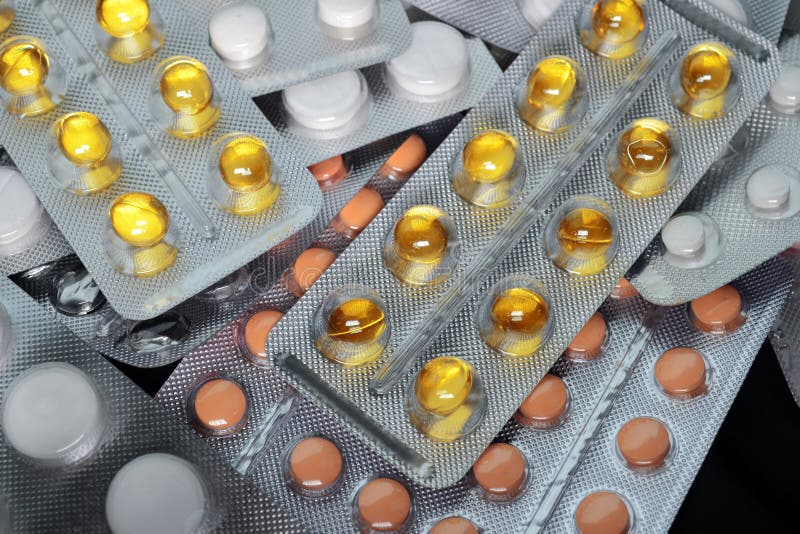 Yellow, White and Orange Medical Tablets in Pack, Tablets and Capsules ...