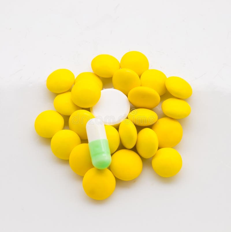 Yellow and white tablet stock image. Image of narcotic - 17426501