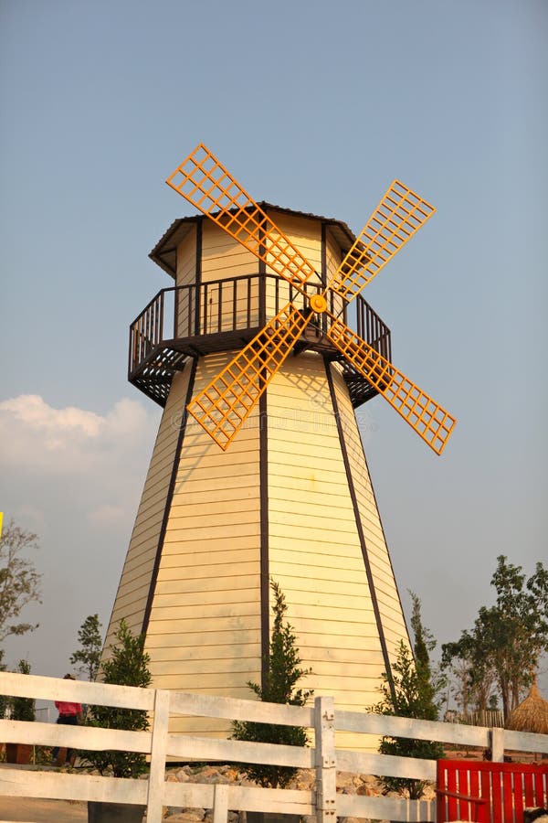 Yellow Building & Windmill stock image. Image of historical - 63853737