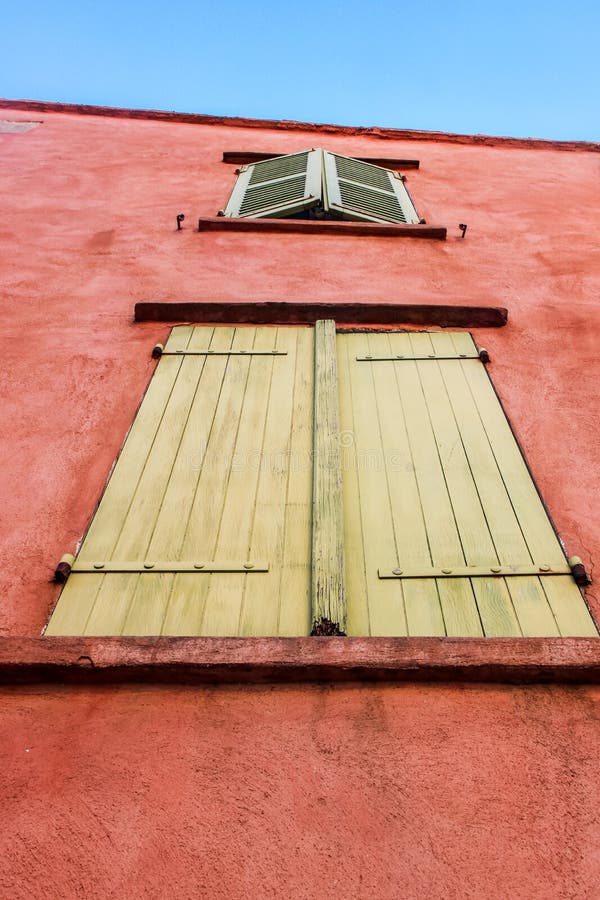 Yellow Windows on Red Building Stock Photo - Image of wall, modern ...