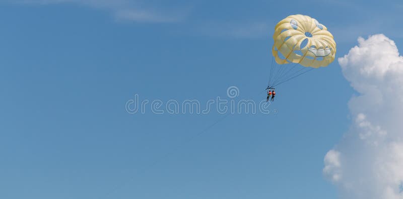 Yellow Wing with Happy Face from Skydiving Pulled by a Boat. Summer ...